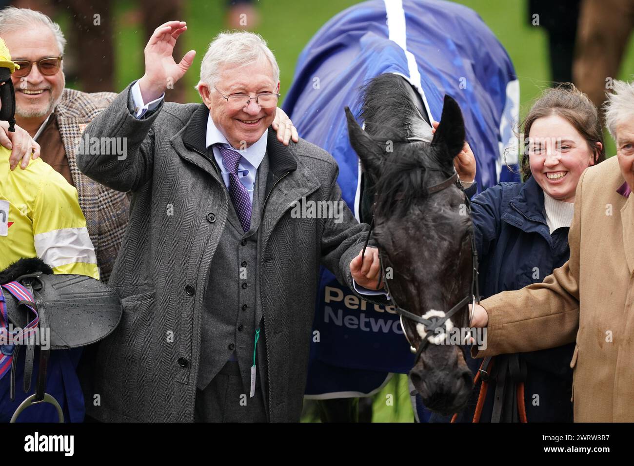 Sir Alex Ferguson, owner of Monmiral, celebrates winning the Pertemps ...