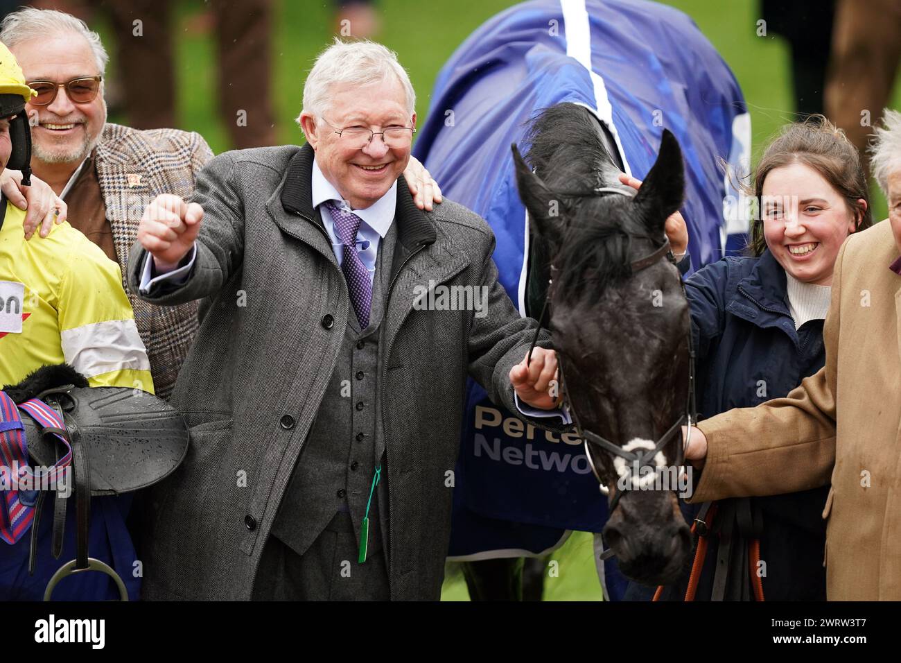 Sir Alex Ferguson, owner of Monmiral, celebrates winning the Pertemps ...