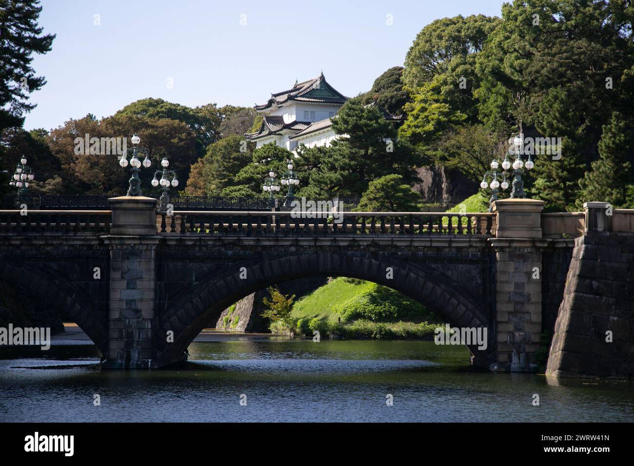 In the Japanese Imperial Palace in Tokyo, Japan, massive stone walls ...