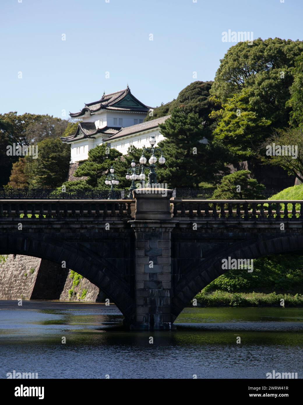 In the Japanese Imperial Palace in Tokyo, Japan, massive stone walls ...