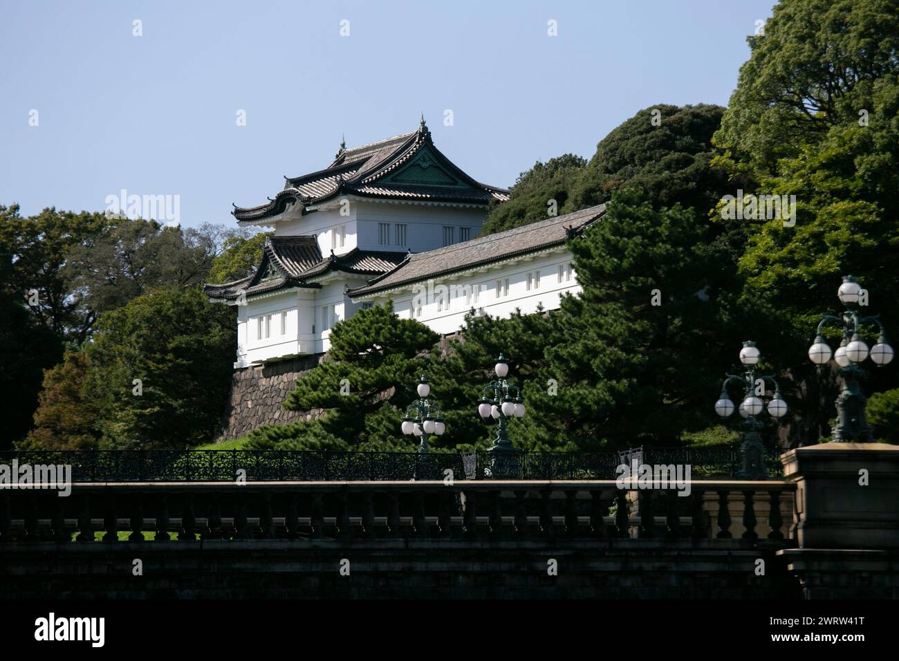 In the Japanese Imperial Palace in Tokyo, Japan, massive stone walls ...