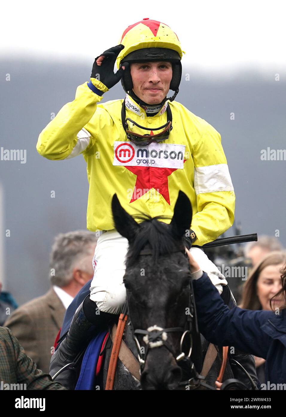 Jockey Harry Cobden celebrates after winnning the Pertemps Network ...