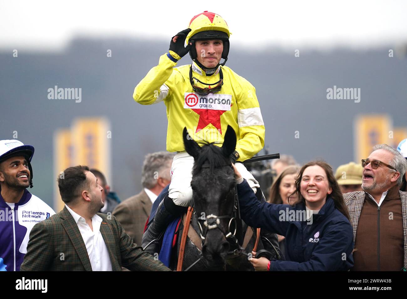 Jockey Harry Cobden celebrates after winnning the Pertemps Network ...