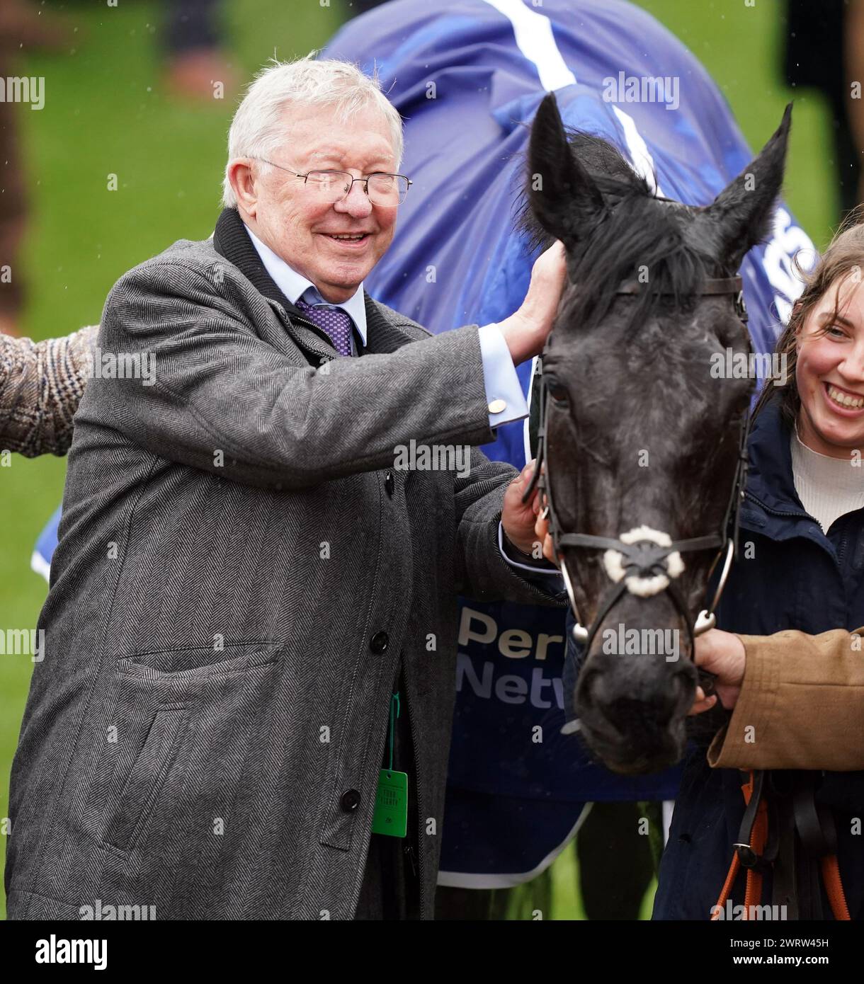 Sir Alex Ferguson, owner of Monmiral, celebrates winning the Pertemps ...