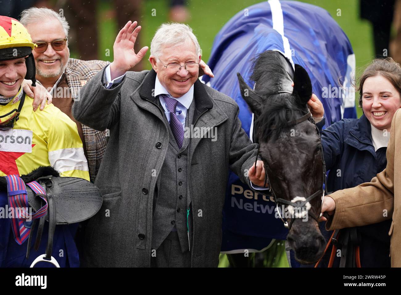 Sir Alex Ferguson, owner of Monmiral, celebrates winning the Pertemps ...