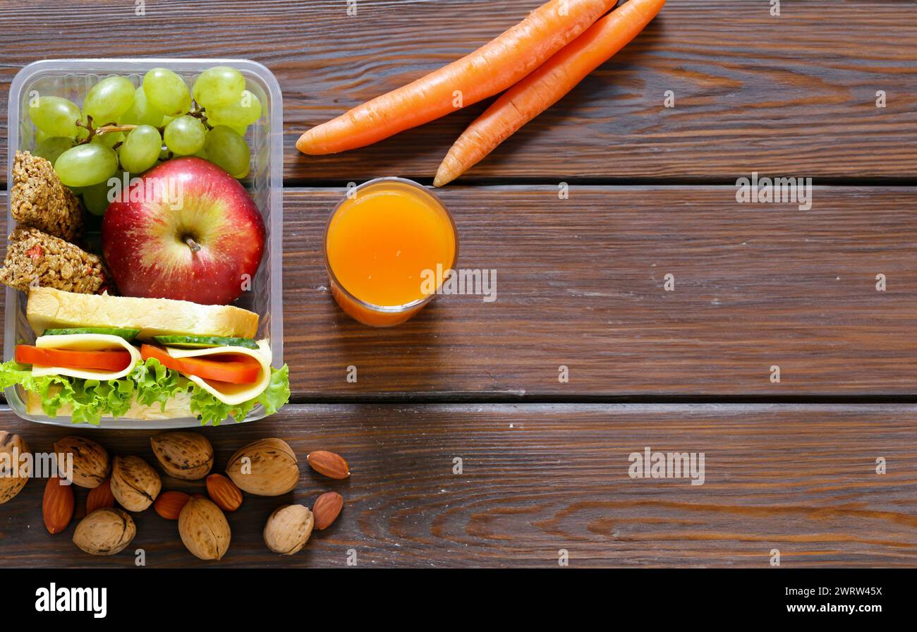 lunch box with fresh fruit and sandwich Stock Photo - Alamy