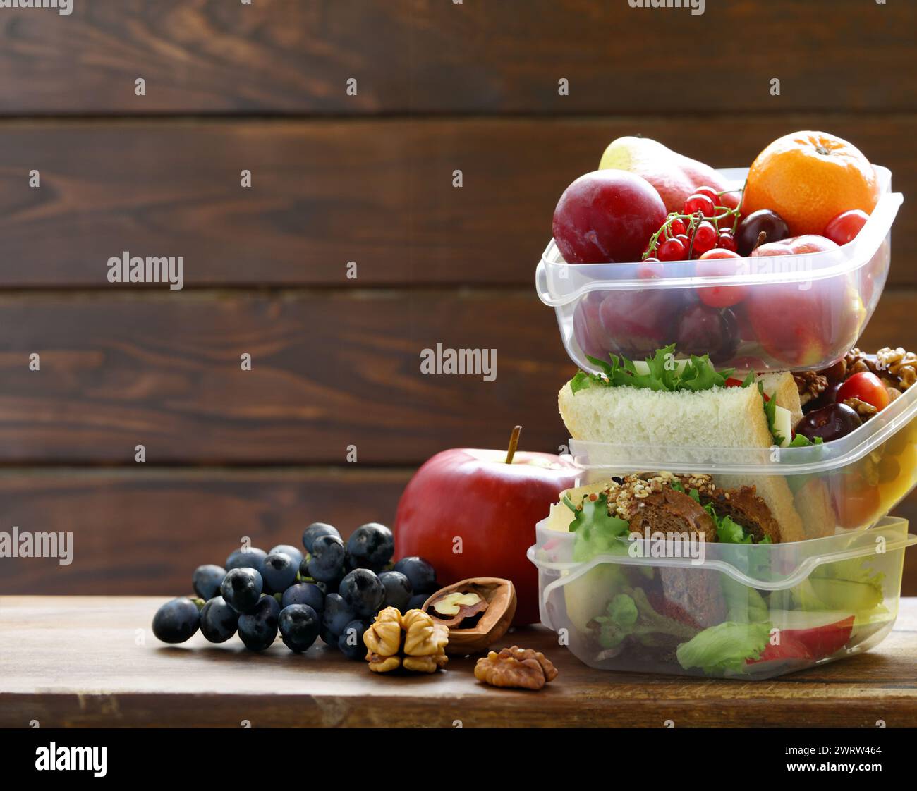 lunch box with fresh fruit and sandwich Stock Photo - Alamy