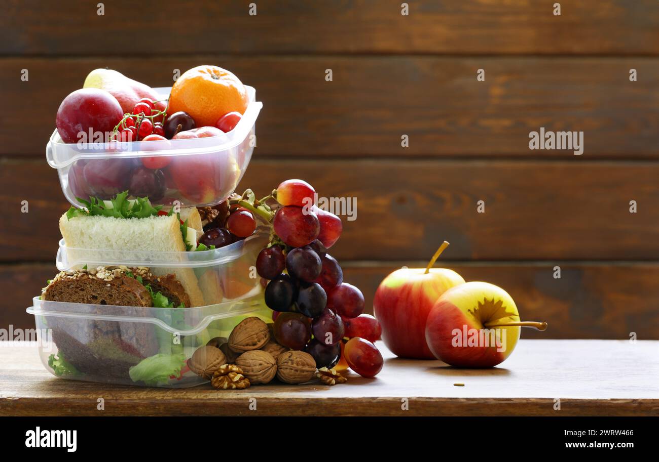lunch box with fresh fruit and sandwich Stock Photo - Alamy