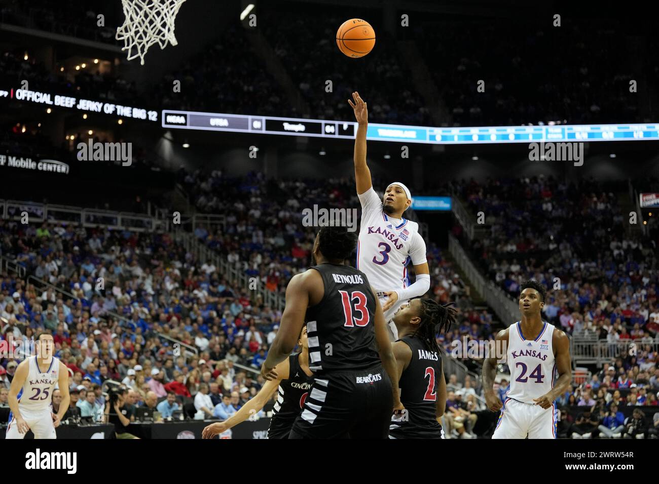 MAR 13 2024: Kansas Jayhawks guard Dajuan Harris Jr. (3) shoots against Cincinnati Bearcats ...