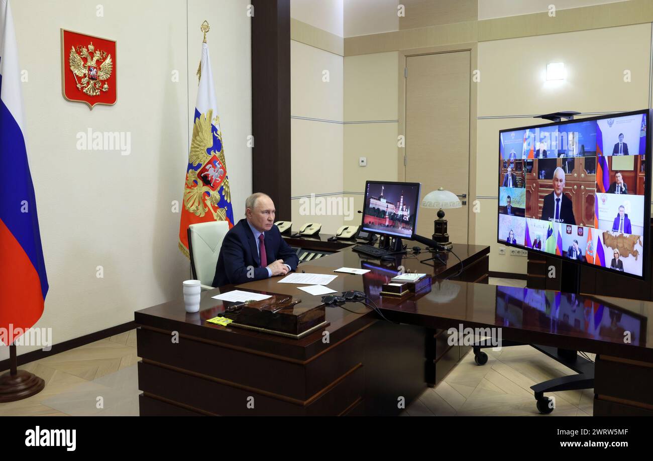 Russian President Vladimir Putin attends a cabinet meeting via ...