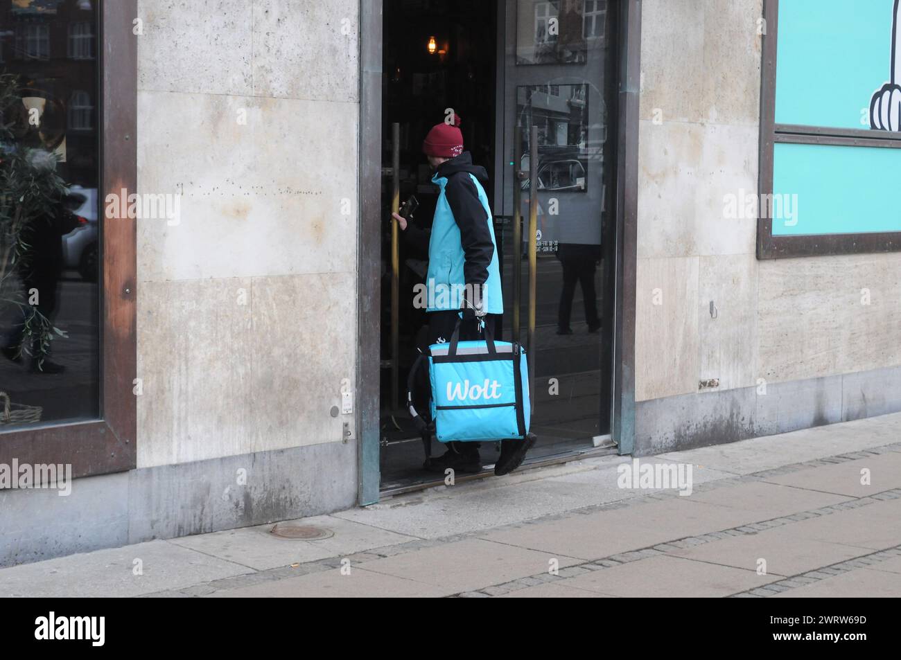 Copenhagen, Denmark /14 March 2024/. Wolt partner food delivery bikers ...