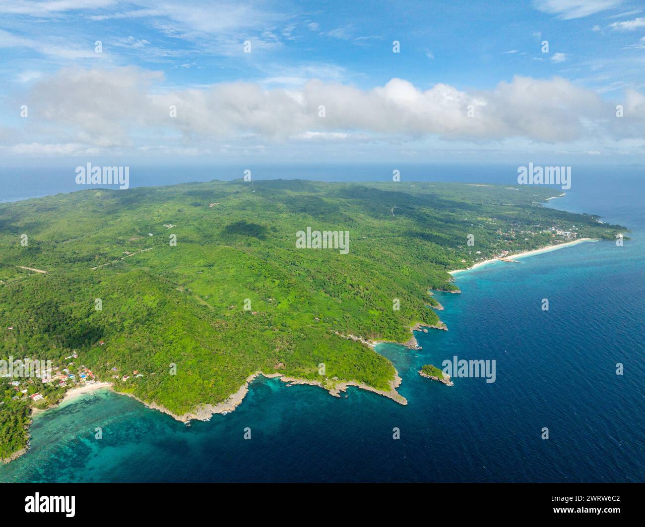 Aerial view of Carabao Island with green forest, jungle and beaches at ...