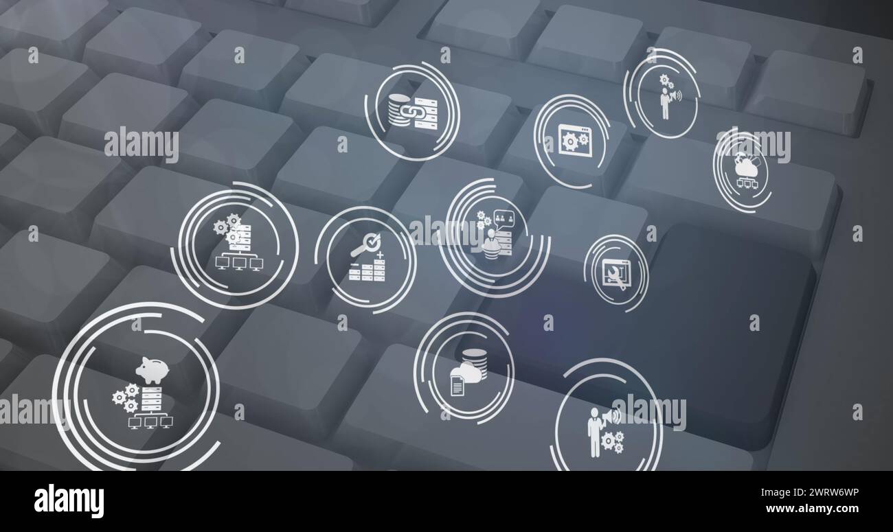 Image of digital online icons over computer keyboard on grey background Stock Photo - Alamy