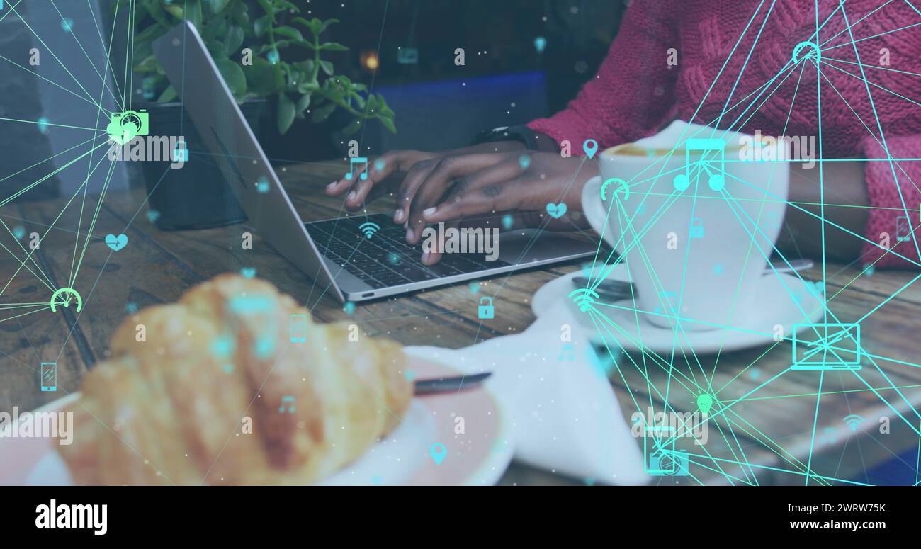 Image of connected media icons over african american woman using laptop ...