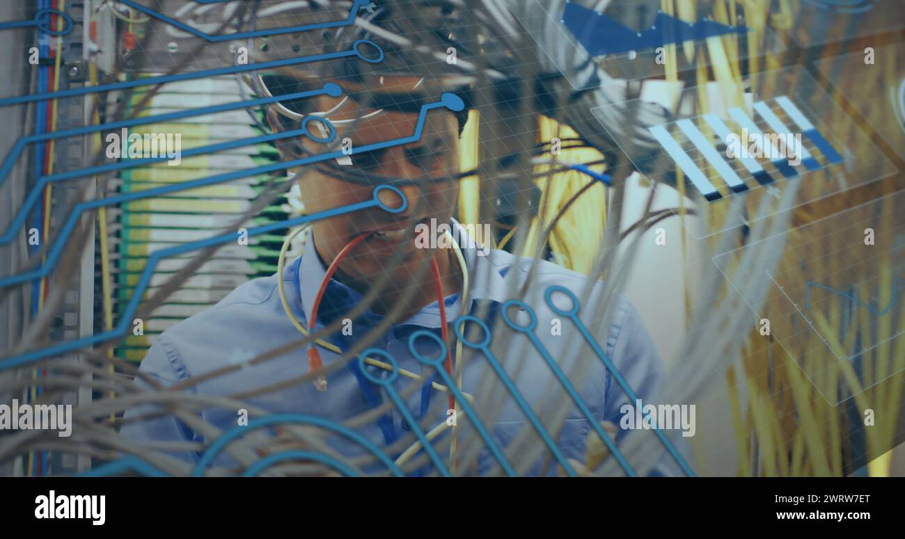 Image of interface with data processing over caucasian male engineer working at server room ...