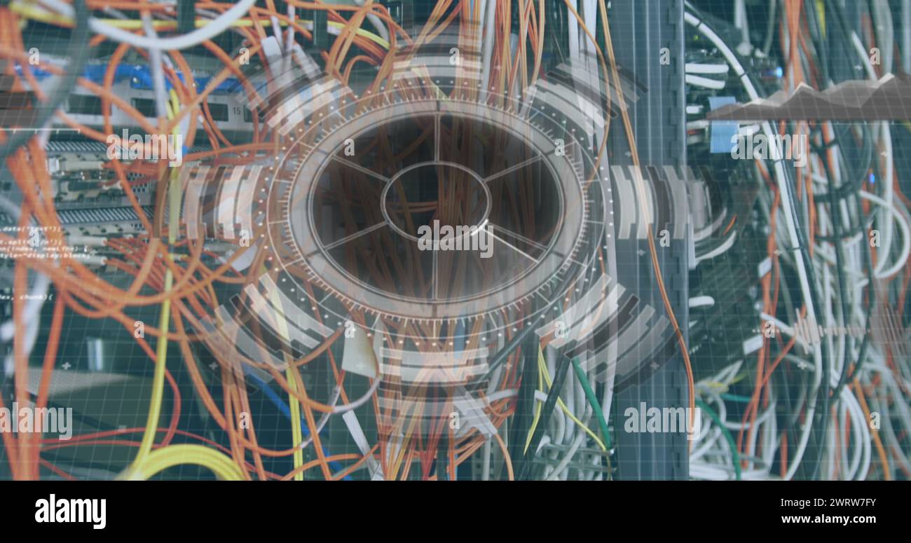 A tangle of colorful wires surrounds a circular device Stock Photo - Alamy