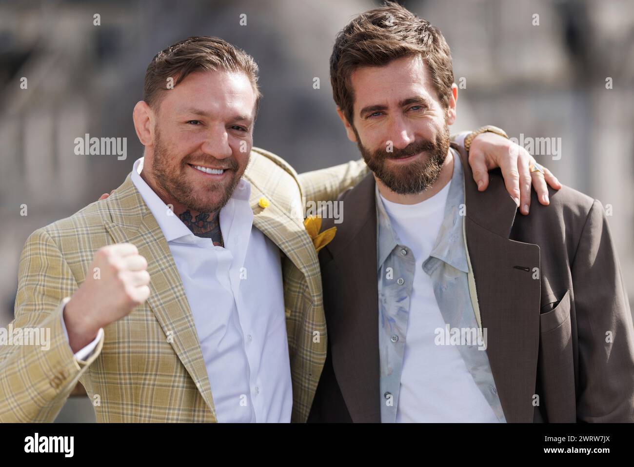 Conor McGregor and Jake Gyllenhaal, right, pose for photographers ...