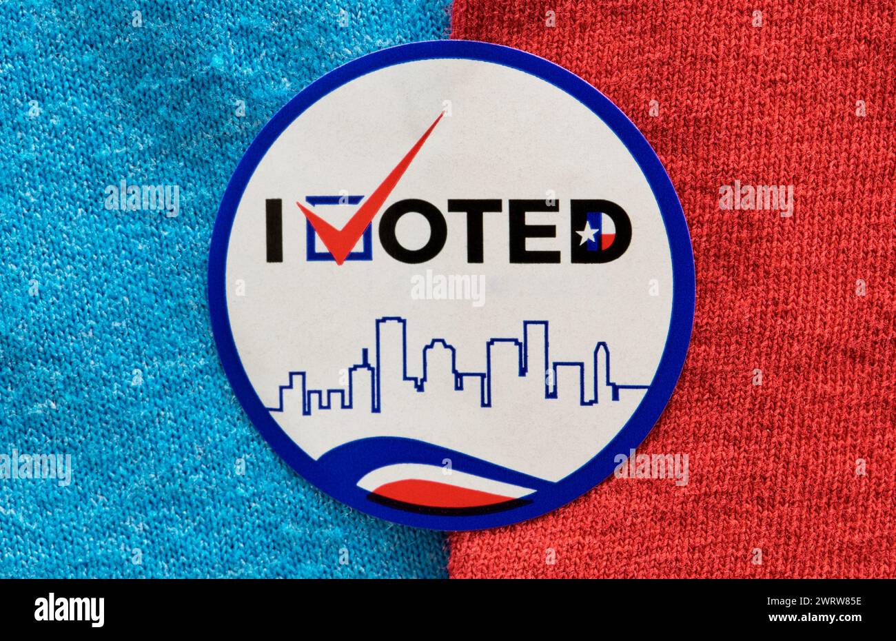 I Voted sticker split between red and blue materials indicating both ...