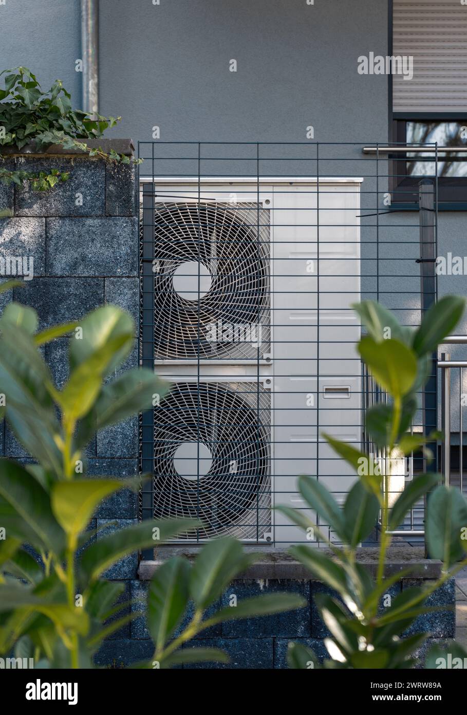 Air heat pump unit, Air source heat pumps installed on the outside of a ...