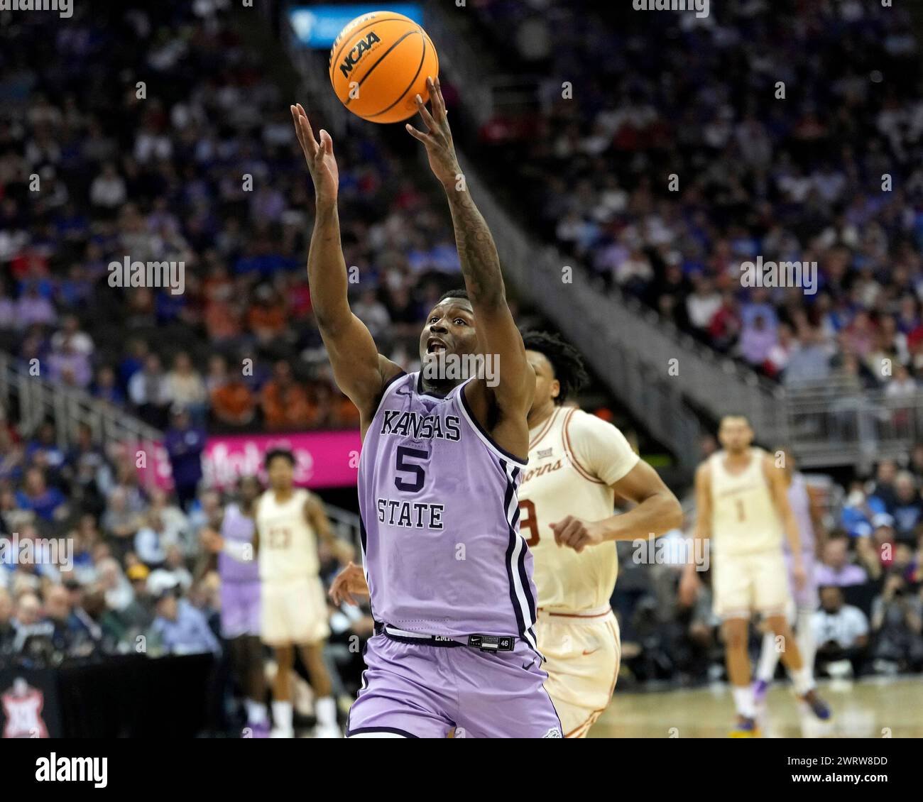 MAR 13 2024: Kansas State Wildcats guard Cam Carter (5) hauls in a long ...