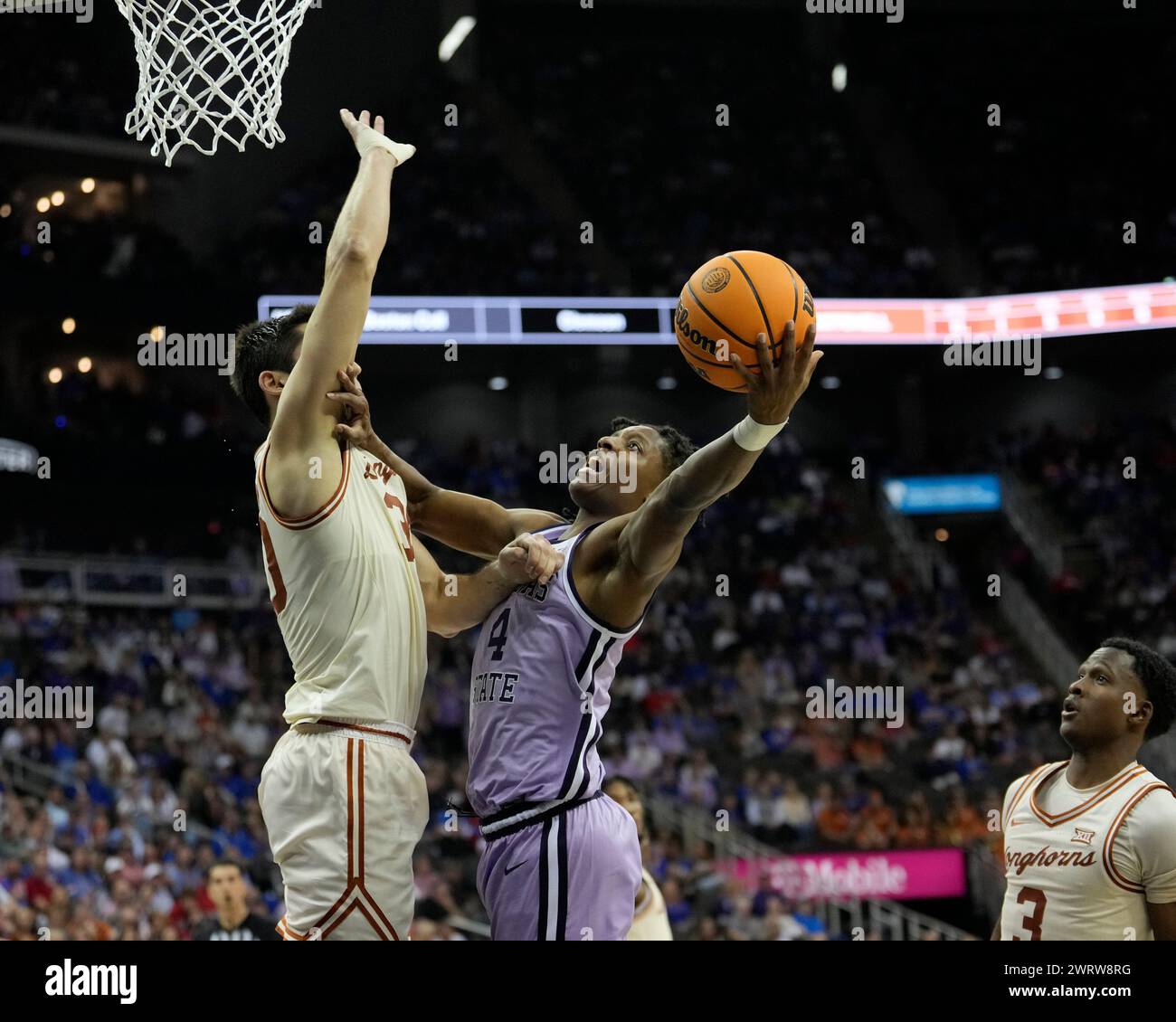 MAR 13 2024: Kansas State Wildcats guard Dai Dai Ames (4) tries to put ...