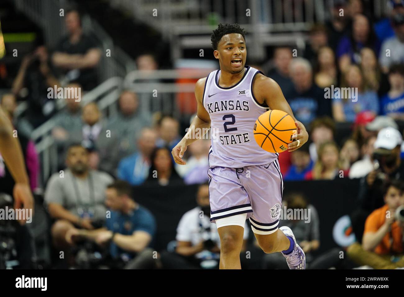 MAR 13 2024: Kansas State Wildcats guard Tylor Perry (2) calls out the ...