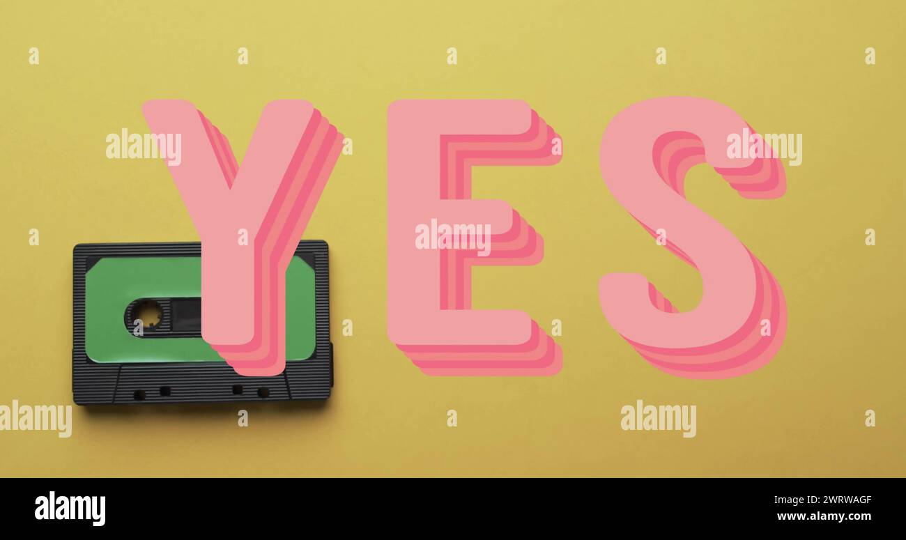 Image of yes text over tape on yellow background Stock Photo - Alamy