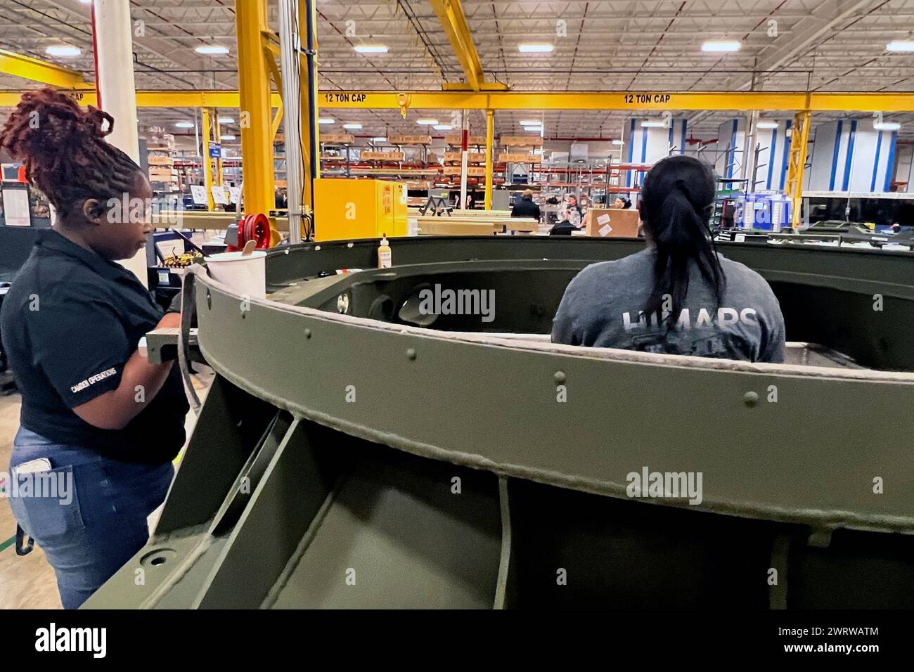 The base of an M270 Multiple Launch Rocket System (MLRS) is assembled ...