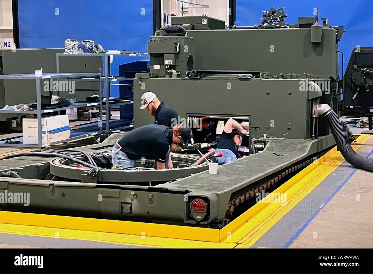 The base of an M270 Multiple Launch Rocket System (MLRS) is assembled ...