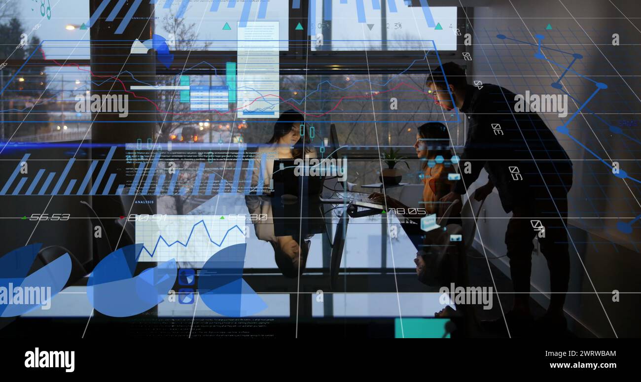 Digital business team works on global network concept in a busy evening ...