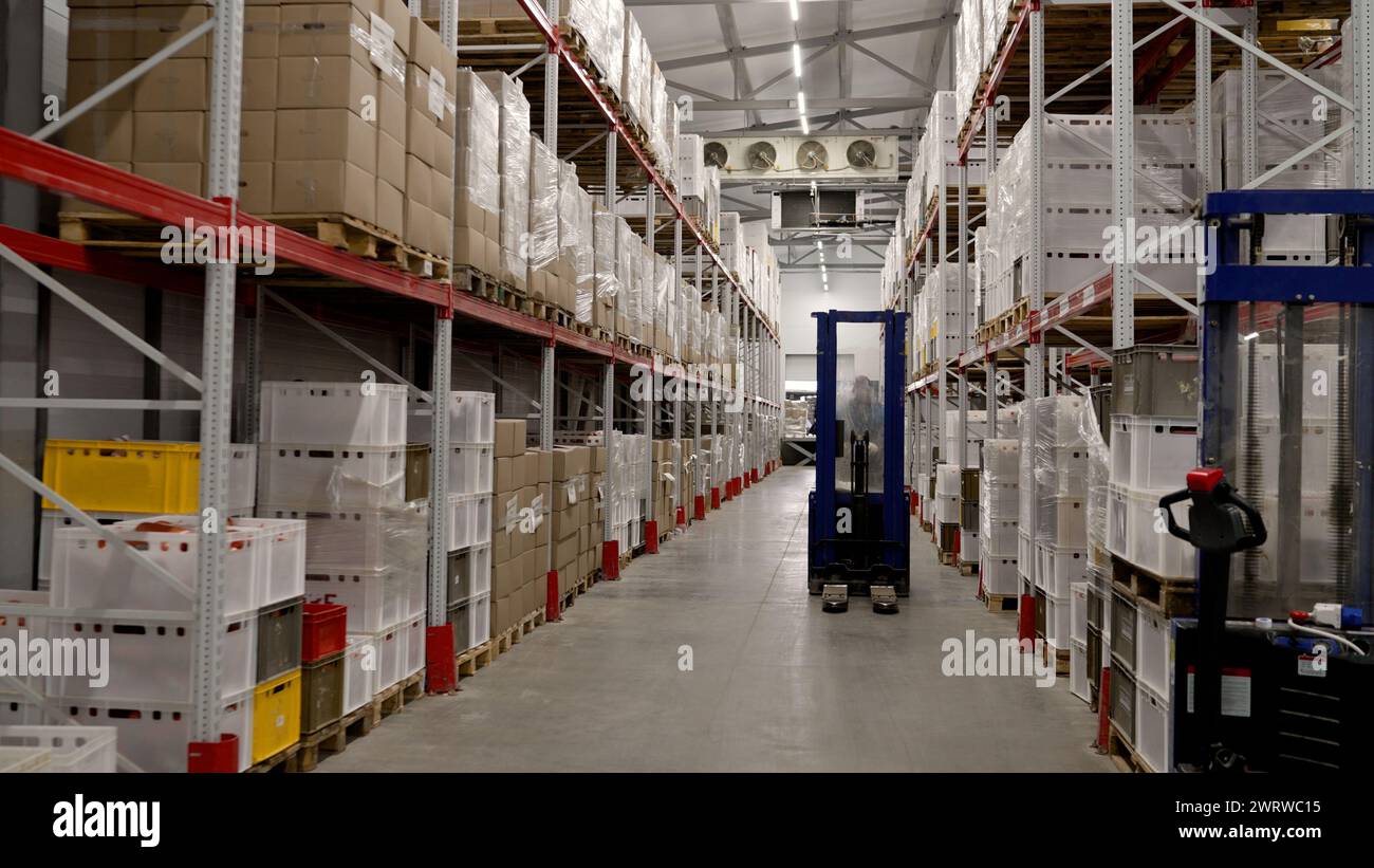Industrial food warehouse with boxes. Large warehouse with boxes of ...