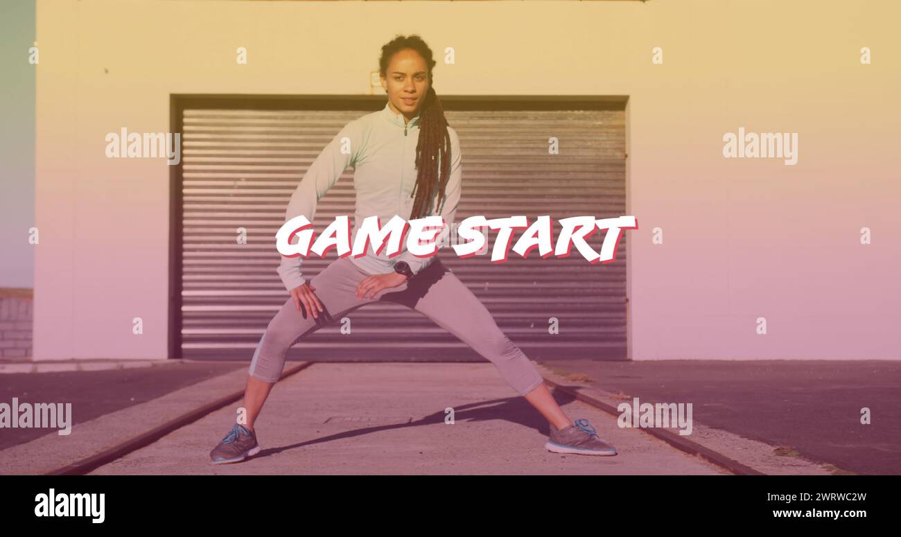 Game start text banner against african american fit woman performing ...