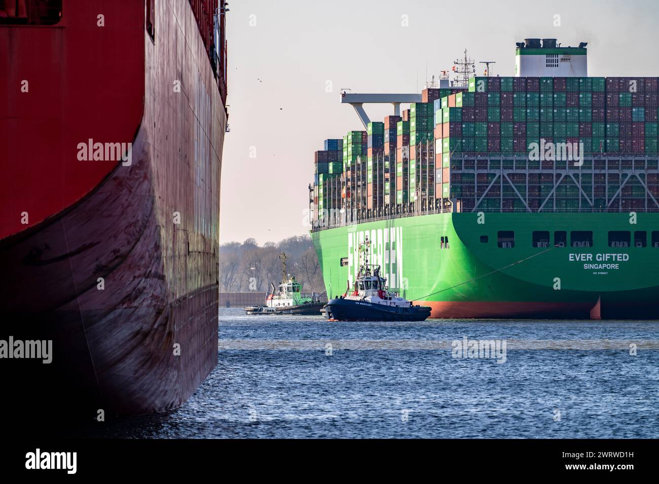 Container ship Ever Gifted, arriving at the port of Hamburg ...