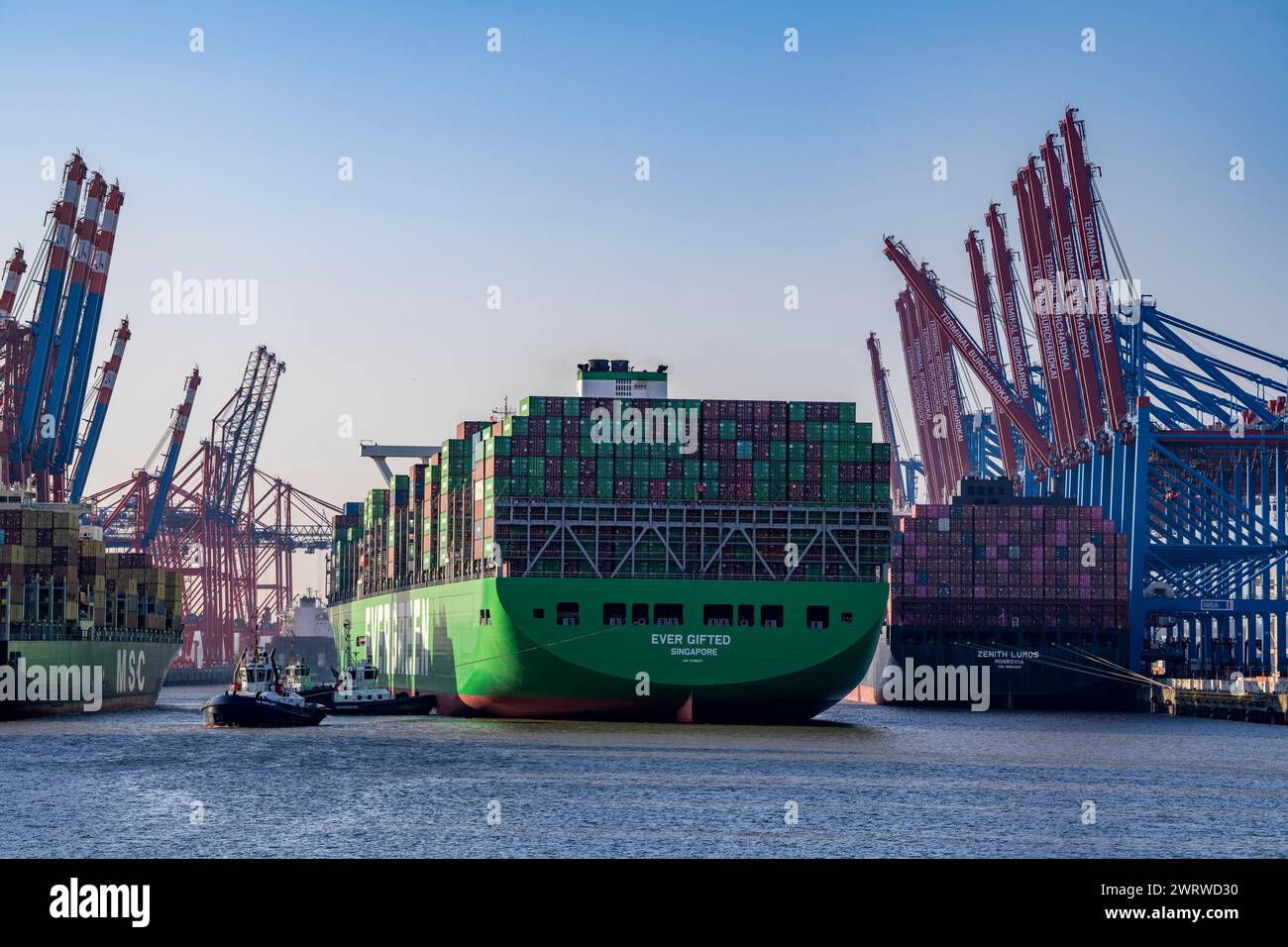 Container ship Ever Gifted, arriving at the port of Hamburg ...