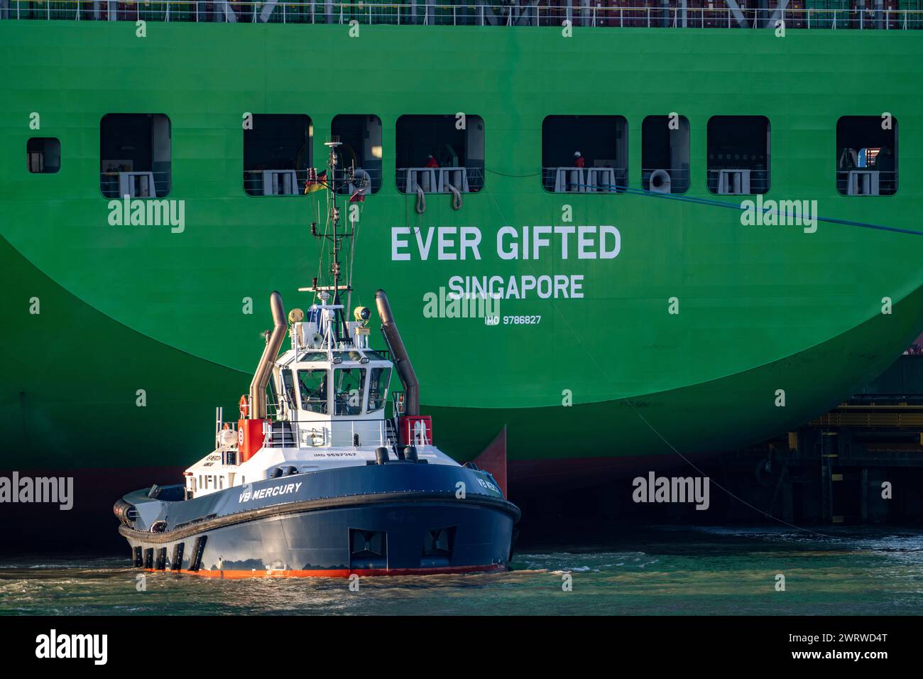 Container ship Ever Gifted, arriving at the port of Hamburg ...