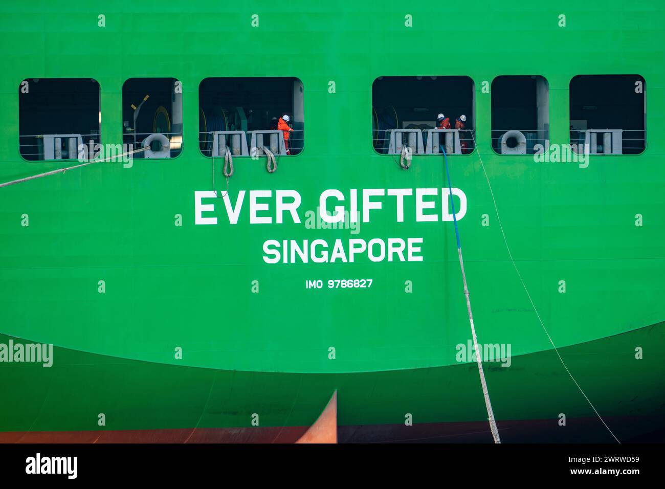 Container ship Ever Gifted, entering the port of Hamburg, Waltershofer ...