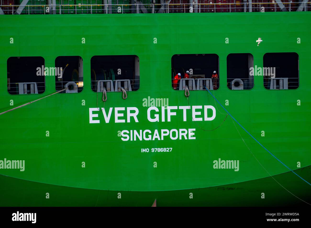 Container ship Ever Gifted, entering the port of Hamburg, Waltershofer ...