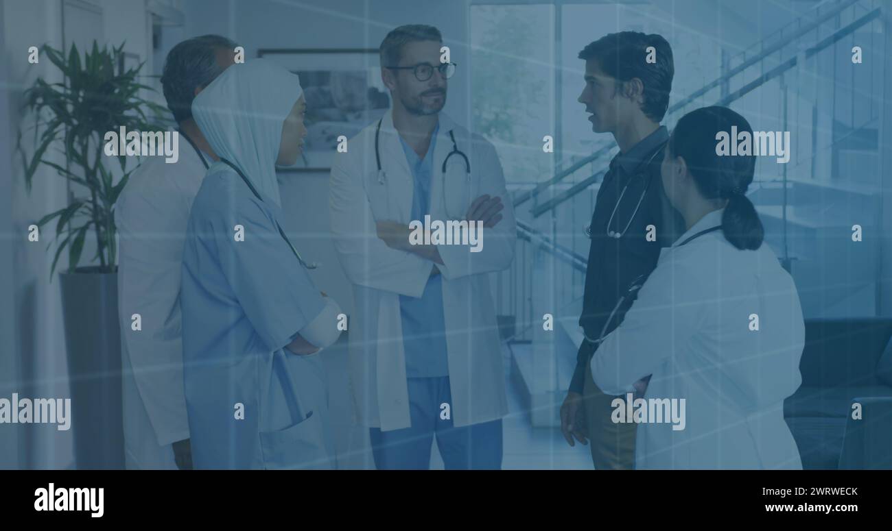 Image of data processing over diverse group of doctors Stock Photo - Alamy