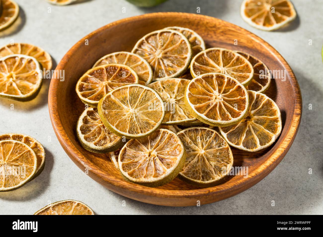 Organic Dried Dehydrated Lime Slices in a Bowl for Garnish Stock Photo ...