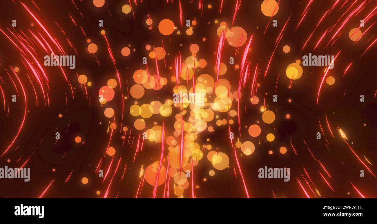 Image of orange spots of light over rotating pink light trails. Colour ...