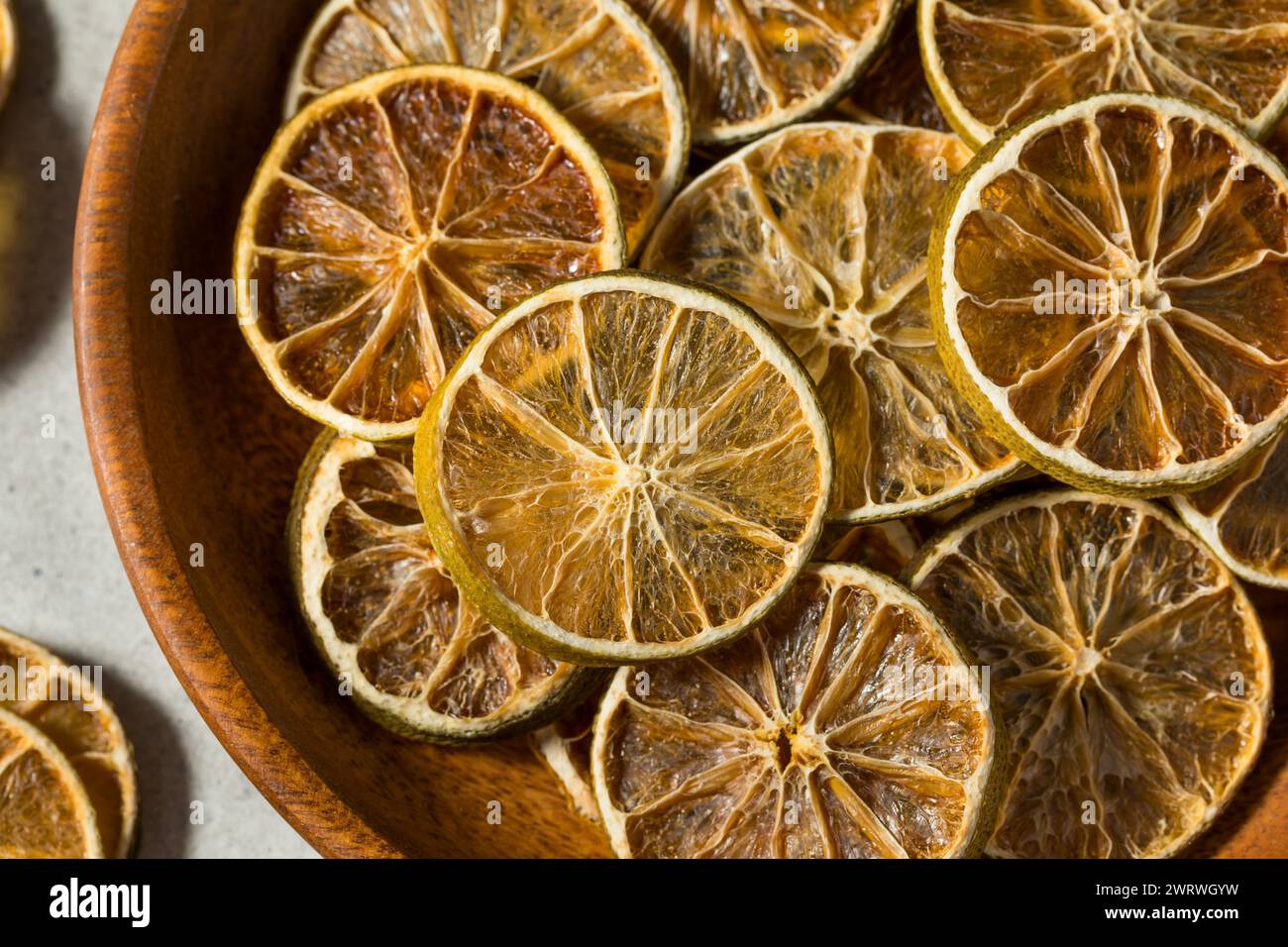 Organic Dried Dehydrated Lime Slices in a Bowl for Garnish Stock Photo ...