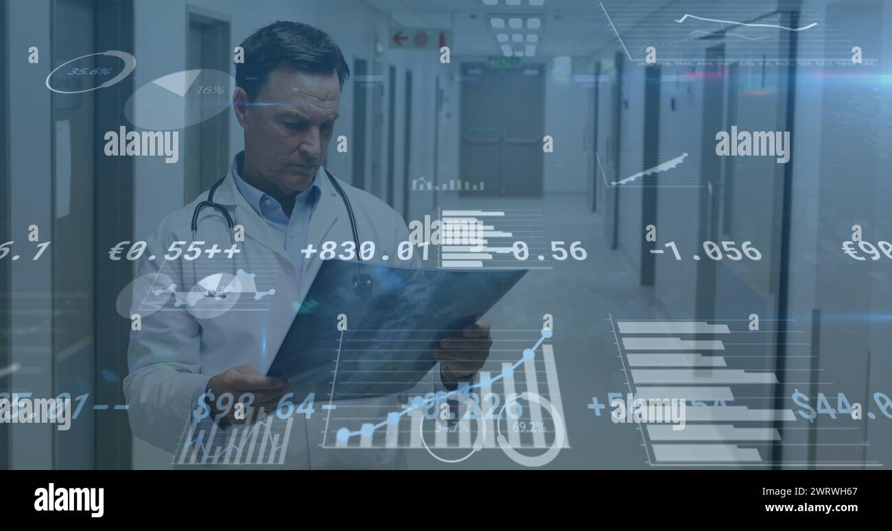 Image of financial data processing over caucasian male doctor with x ...