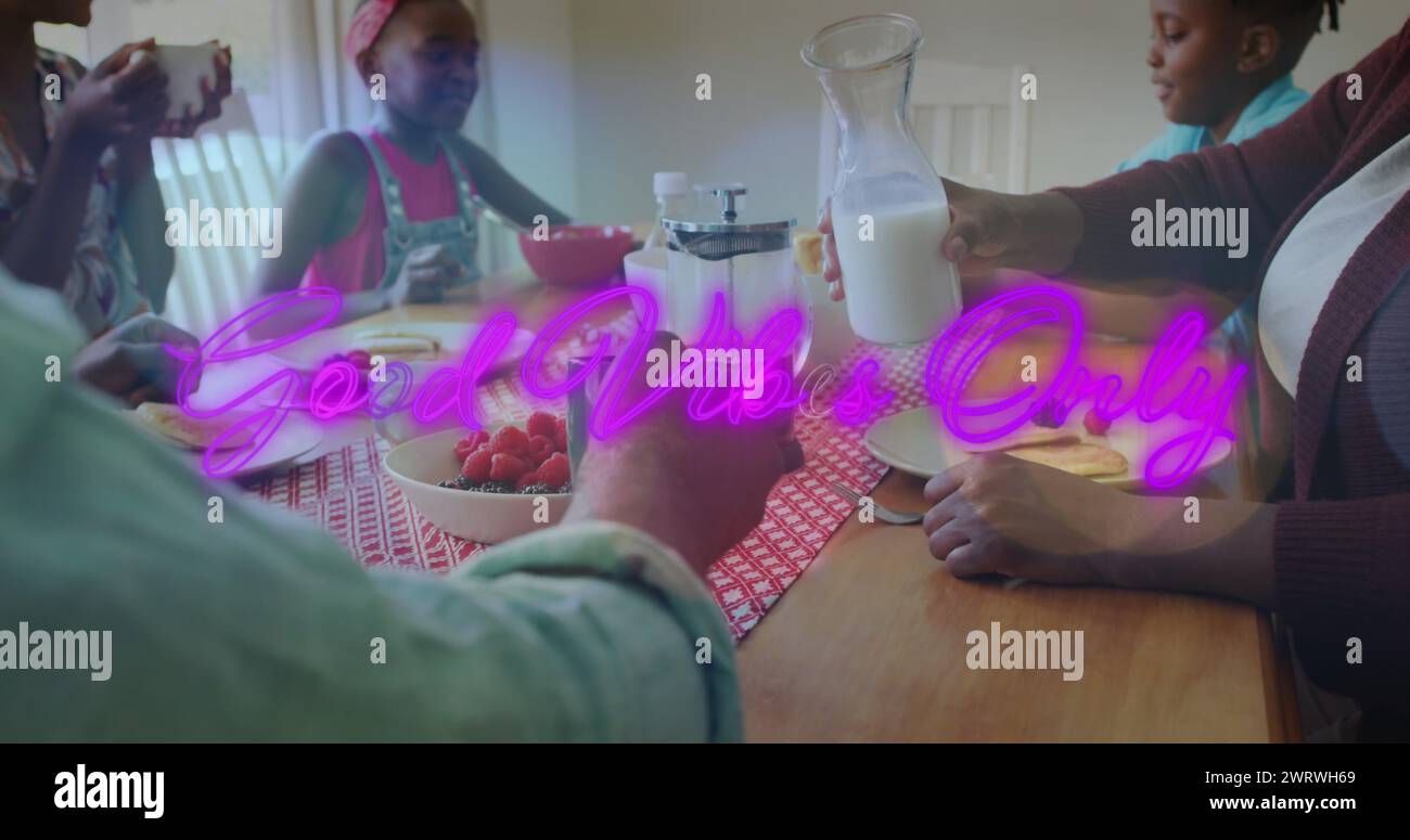 Image of good vibe only text over african american family eating meal ...