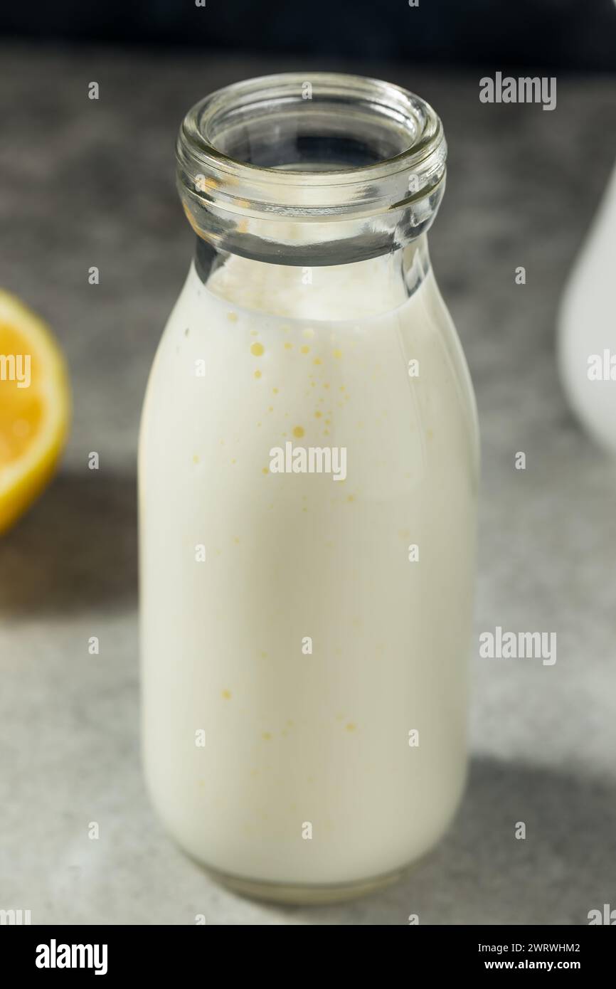 Cold Refreshing White Buttermilk in a Milk Glass Stock Photo - Alamy