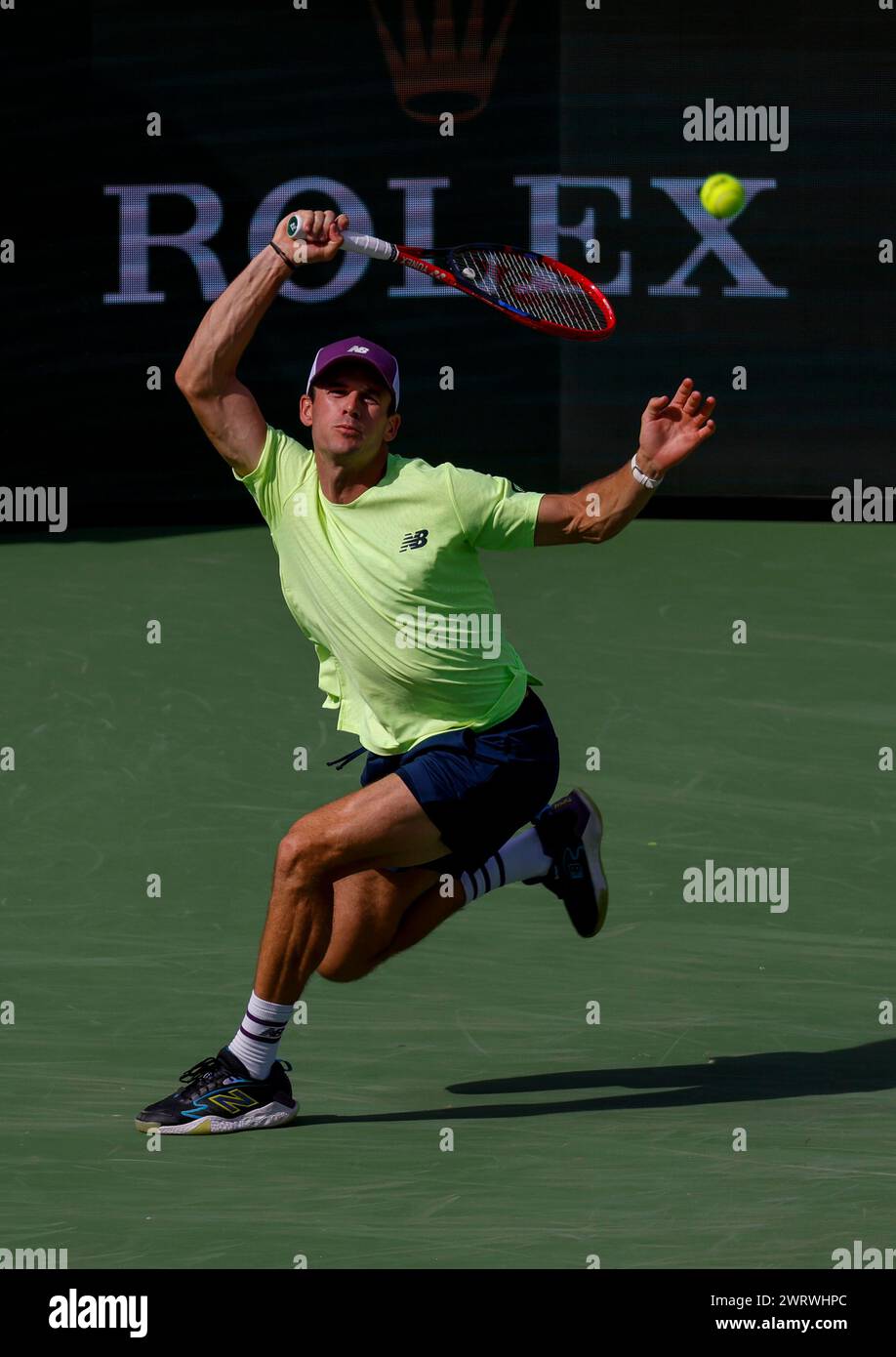 March 13, 2024 Tommy Paul returns a shot against Luca Nardi of Italy ...