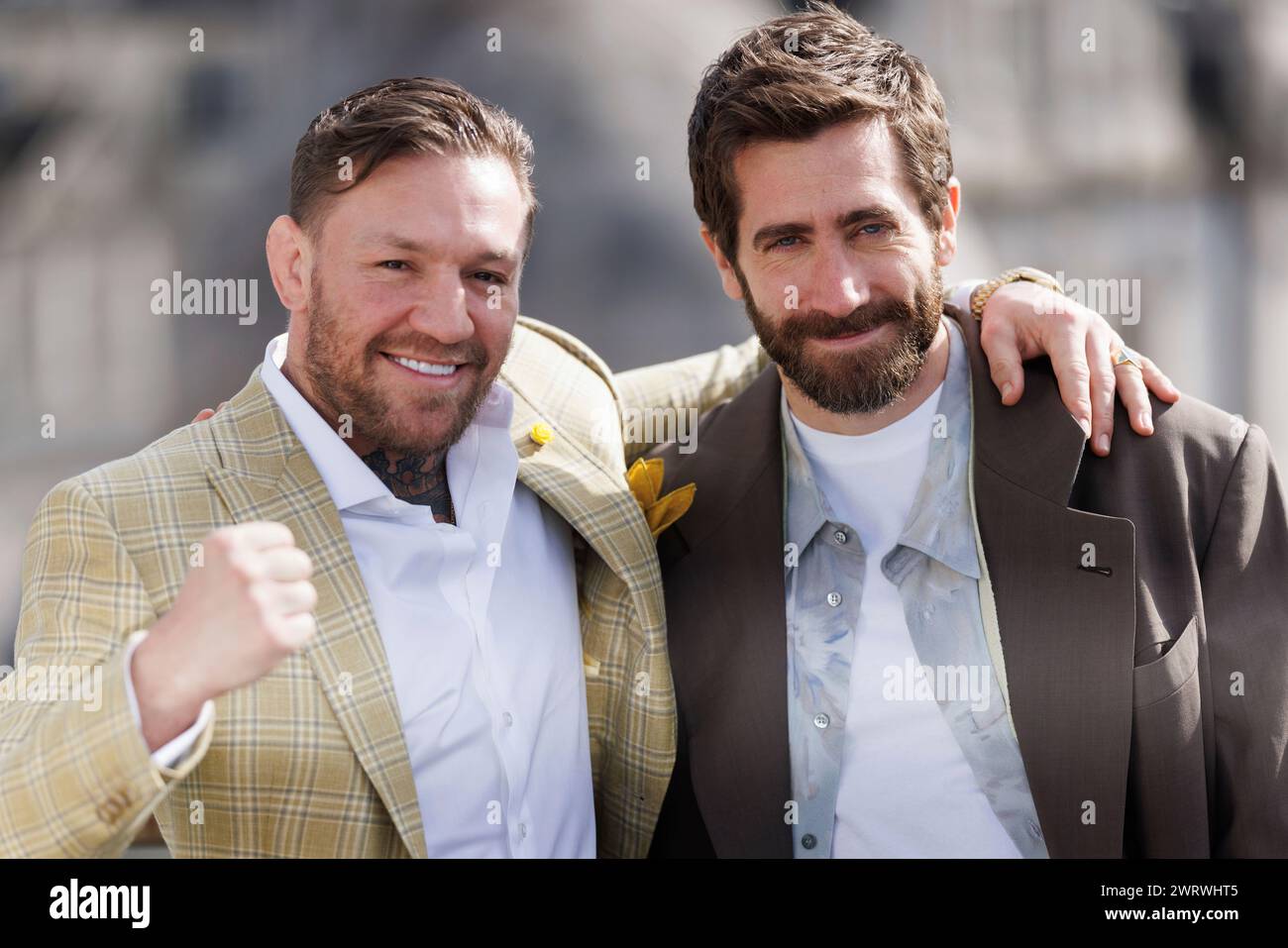 Conor McGregor and Jake Gyllenhaal, right, pose for photographers ...