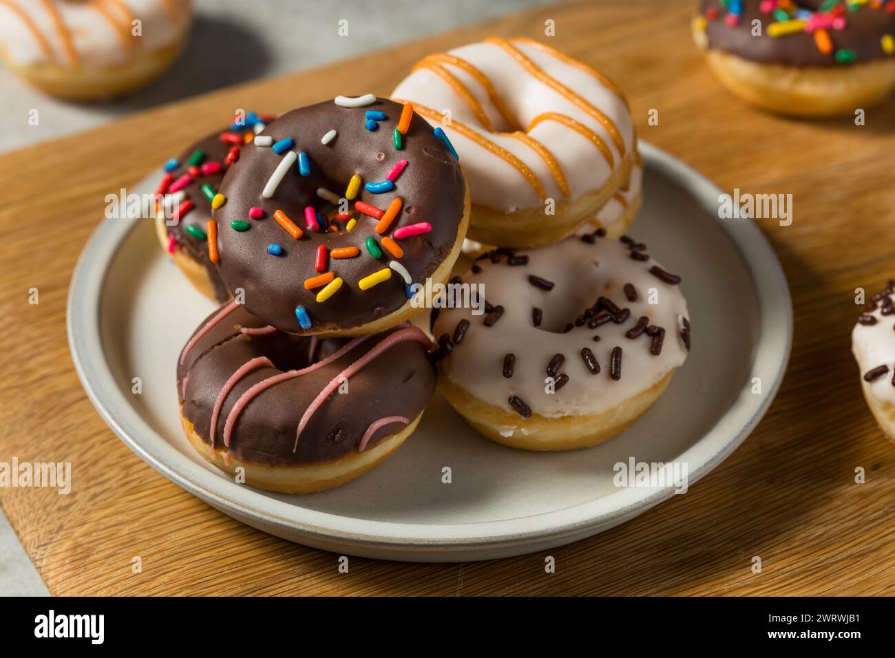 Homemade Small Mini Donuts for Breakfast with Sprinkles and Frosting ...
