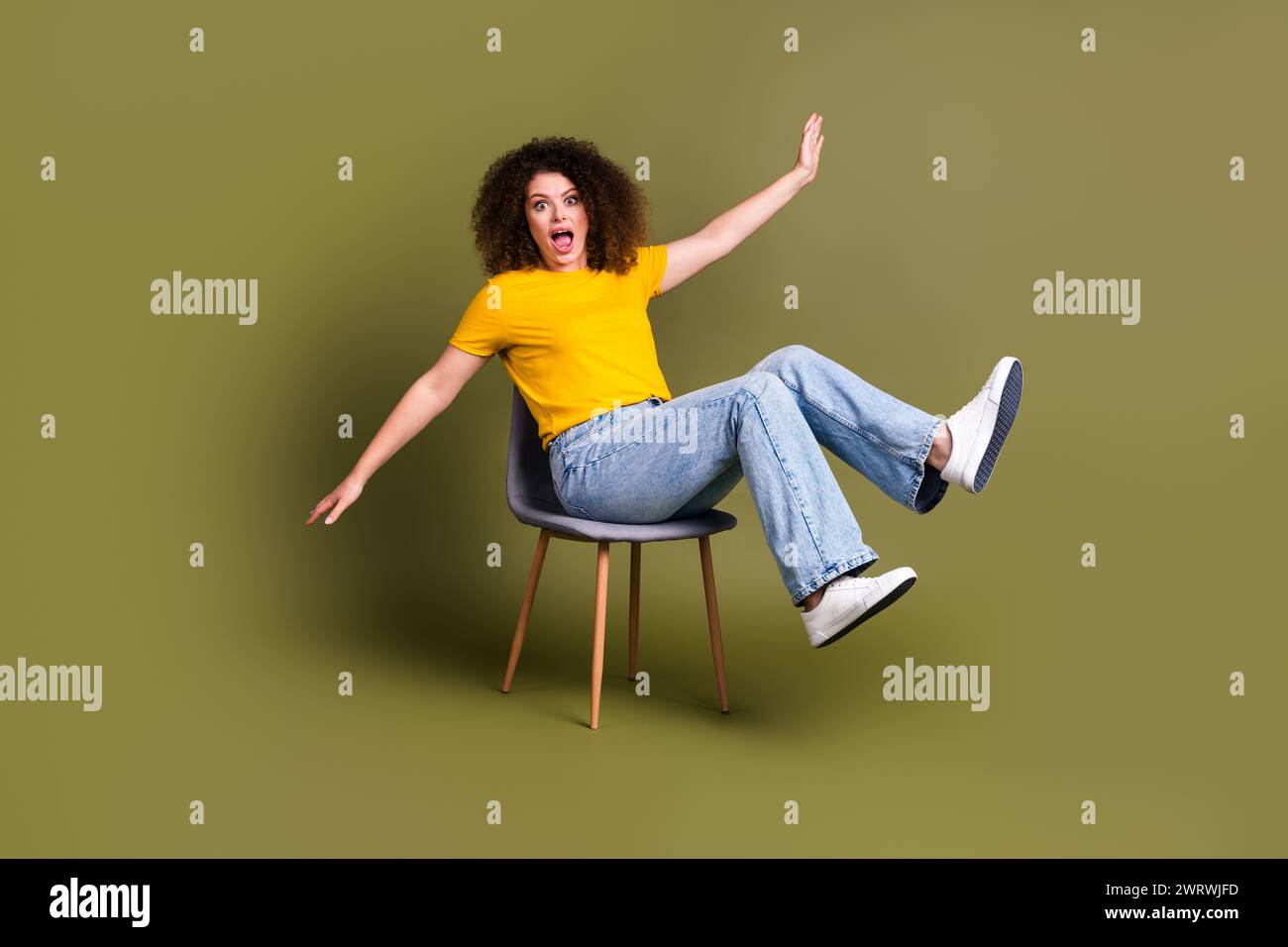 Full body length photo of funny young lady sitting chair lose balance ...
