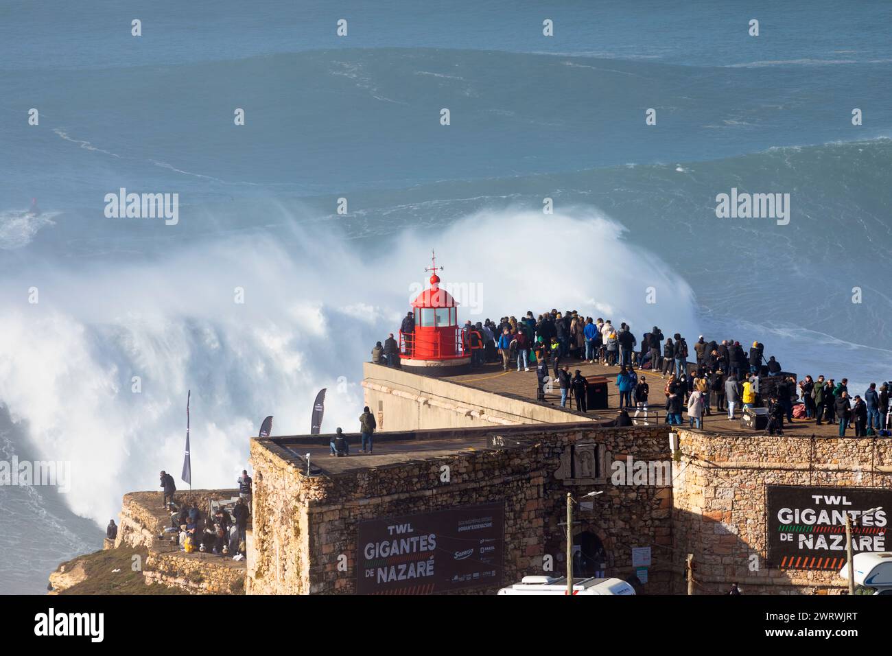 Europe, Portugal, Oeste Region, Nazaré, Crowd watching Surfer 'Wipeout ...