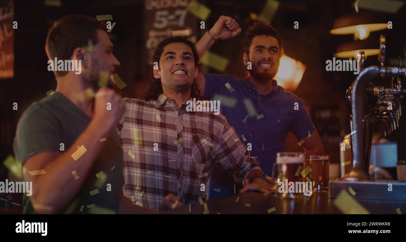 Image of confetti falling men drinking beer in bar Stock Photo - Alamy